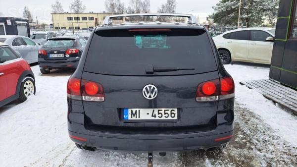 Black Volkswagen Touareg 2008 in Riga, with an engine capacity of 3.00 L and mileage of 319 thousand km for 6500 €, photo 7 on AUTOMOTO.COM.LV