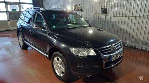 Black Volkswagen Touareg 2008 in Vilnius, with an engine capacity of 2.97 L and mileage of 237 thousand km for 6500 €, photo 10 on AUTOMOTO.COM.LV