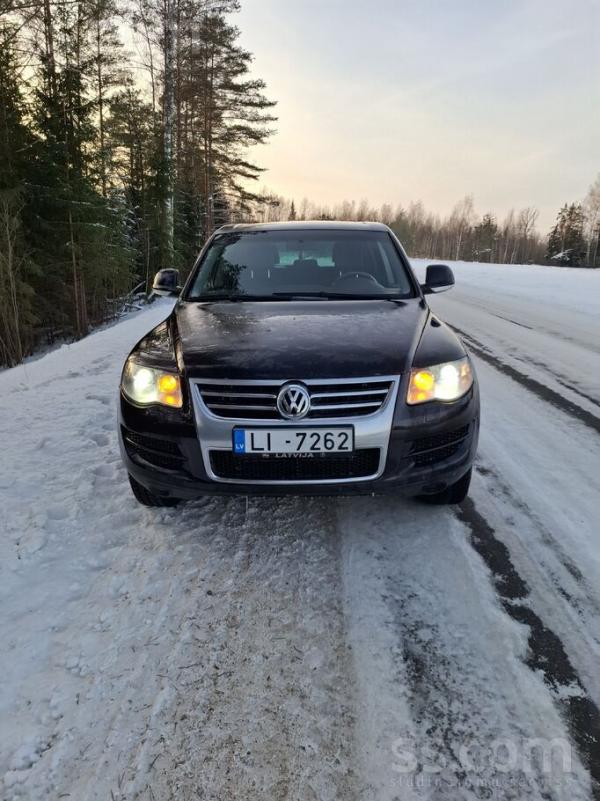 Melns Volkswagen Touareg 2008 Daugavpils, ar dzinēja tilpumu 3.00 L un nobraukumu 260 tūkst. km par 5300 €, foto 1 vietnē AUTOMOTO.COM.LV
