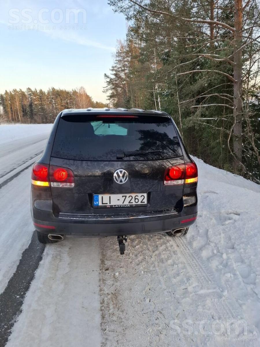 Melns Volkswagen Touareg 2008 Daugavpils, ar dzinēja tilpumu 3.00 L un nobraukumu 260 tūkst. km par 5300 €, foto 26 vietnē AUTOMOTO.COM.LV