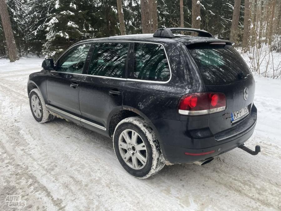 Melns Volkswagen Touareg 2008 Viļņa, ar dzinēja tilpumu 3.00 L un nobraukumu 355 tūkst. km par 4700 €, foto 4 vietnē AUTOMOTO.COM.LV