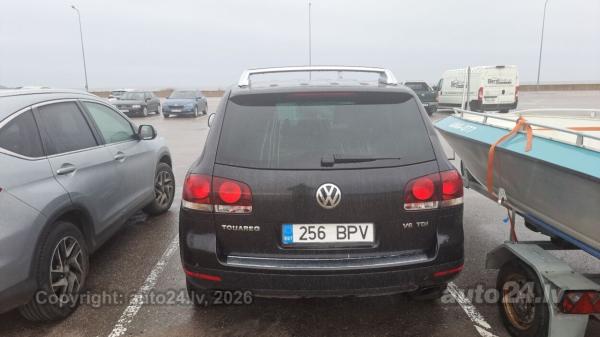 Melns Volkswagen Touareg 2008 Tallina, ar dzinēja tilpumu 3.00 L un nobraukumu 310 tūkst. km par 5000 €, foto 2 vietnē AUTOMOTO.COM.LV