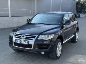 Black Volkswagen Touareg 2008 in Vilnius, with an engine capacity of 2.50 L and mileage of 250 thousand km for 3300 €, photo  on AUTOMOTO.COM.LV
