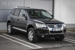 Black Volkswagen Touareg 2008 in Riga, with an engine capacity of 3.00 L and mileage of 306 thousand km for 6500 €, photo 4 on AUTOMOTO.COM.LV
