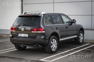 Black Volkswagen Touareg 2008 in Riga, with an engine capacity of 3.00 L and mileage of 306 thousand km for 6500 €, photo 5 on AUTOMOTO.COM.LV
