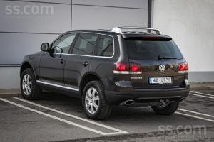 Black Volkswagen Touareg 2008 in Riga, with an engine capacity of 3.00 L and mileage of 306 thousand km for 6500 €, photo 7 on AUTOMOTO.COM.LV