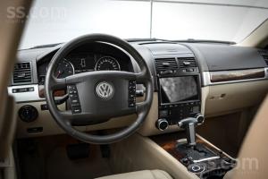 Black Volkswagen Touareg 2008 in Riga, with an engine capacity of 3.00 L and mileage of 306 thousand km for 6500 €, photo 18 on AUTOMOTO.COM.LV