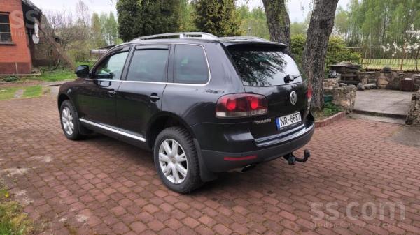 Black Volkswagen Touareg 2008 in Riga, with an engine capacity of 3.00 L and mileage of 392 thousand km for 4900 €, photo 3 on AUTOMOTO.COM.LV