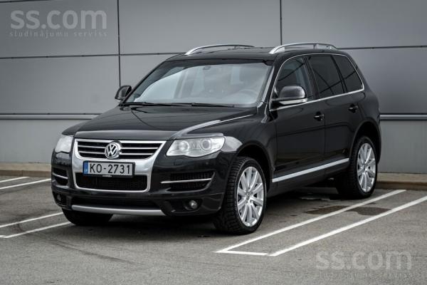 Black Volkswagen Touareg 2008 in Riga, with an engine capacity of 3.00 L and mileage of 0 thousand km for 5990 €, photo 1 on AUTOMOTO.COM.LV