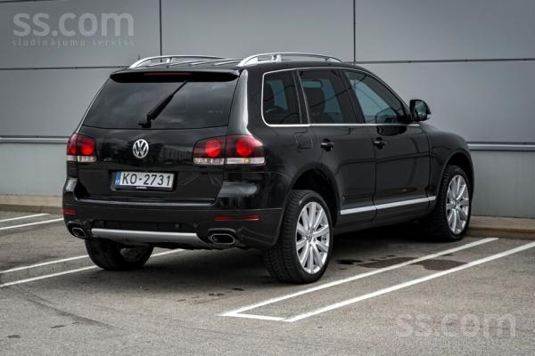 Black Volkswagen Touareg 2008 in Riga, with an engine capacity of 3.00 L and mileage of 0 thousand km for 5990 €, photo 4 on AUTOMOTO.COM.LV