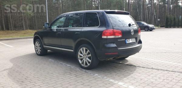 Melns Volkswagen Touareg 2008 Rīga, ar dzinēja tilpumu 3.00 L un nobraukumu 413 tūkst. km par 2000 €, foto 2 vietnē AUTOMOTO.COM.LV