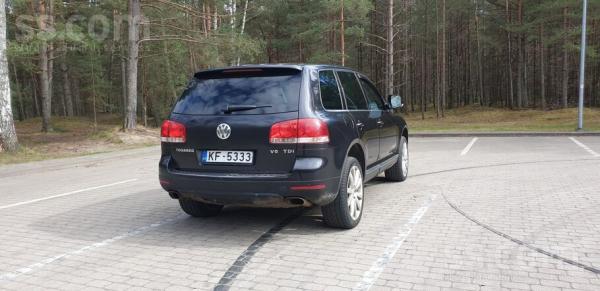 Melns Volkswagen Touareg 2008 Rīga, ar dzinēja tilpumu 3.00 L un nobraukumu 413 tūkst. km par 2000 €, foto 3 vietnē AUTOMOTO.COM.LV