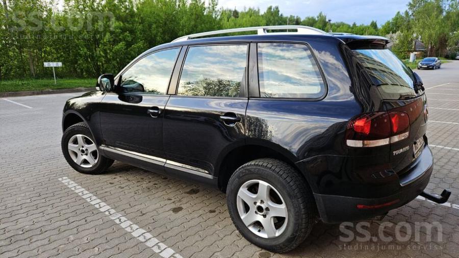 Melns Volkswagen Touareg 2008 Rīga, ar dzinēja tilpumu 2.50 L un nobraukumu 250 tūkst. km par 3900 €, foto 4 vietnē AUTOMOTO.COM.LV