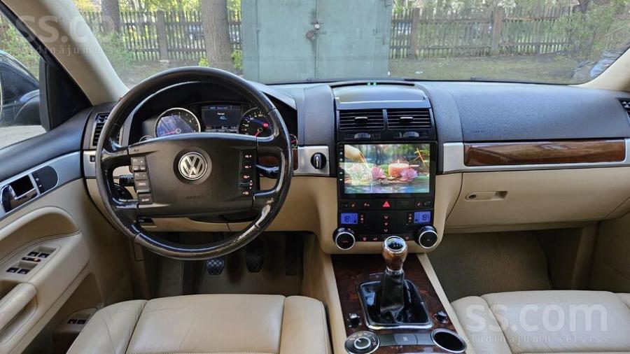 Melns Volkswagen Touareg 2008 Rīga, ar dzinēja tilpumu 2.50 L un nobraukumu 250 tūkst. km par 3900 €, foto 15 vietnē AUTOMOTO.COM.LV