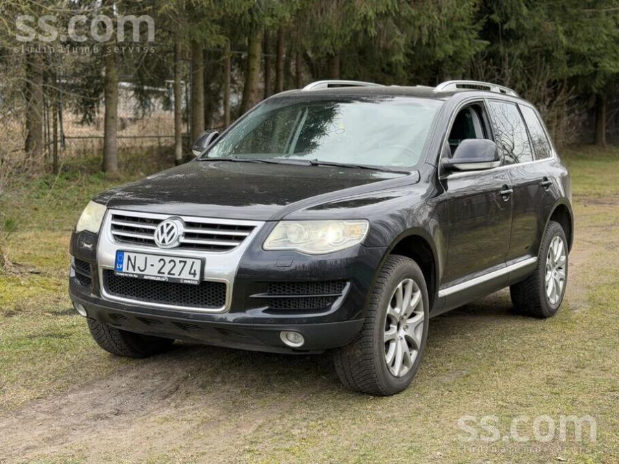 Melns Volkswagen Touareg 2008 Rīga, ar dzinēja tilpumu 3.00 L un nobraukumu 300 tūkst. km par 4500 €, foto 1 vietnē AUTOMOTO.COM.LV
