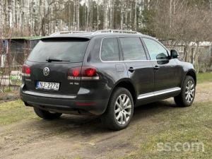 Melns Volkswagen Touareg 2008 Rīga, ar dzinēja tilpumu 3.00 L un nobraukumu 300 tūkst. km par 4500 €, foto 4 vietnē AUTOMOTO.COM.LV