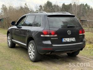 Melns Volkswagen Touareg 2008 Rīga, ar dzinēja tilpumu 3.00 L un nobraukumu 300 tūkst. km par 4500 €, foto 5 vietnē AUTOMOTO.COM.LV