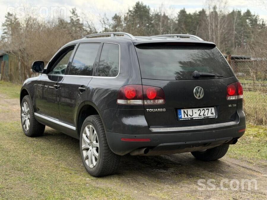 Melns Volkswagen Touareg 2008 Rīga, ar dzinēja tilpumu 3.00 L un nobraukumu 300 tūkst. km par 4500 €, foto 5 vietnē AUTOMOTO.COM.LV