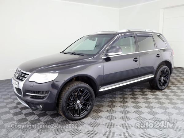 Melns Volkswagen Touareg 2008 Tallina, ar dzinēja tilpumu 3.00 L un nobraukumu 328 tūkst. km par 3499 €, foto 2 vietnē AUTOMOTO.COM.LV