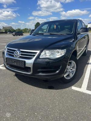 Black Volkswagen Touareg 2008 in Utena, with an engine capacity of 2.97 L and mileage of 305 thousand km for 4500 €, photo  on AUTOMOTO.COM.LV