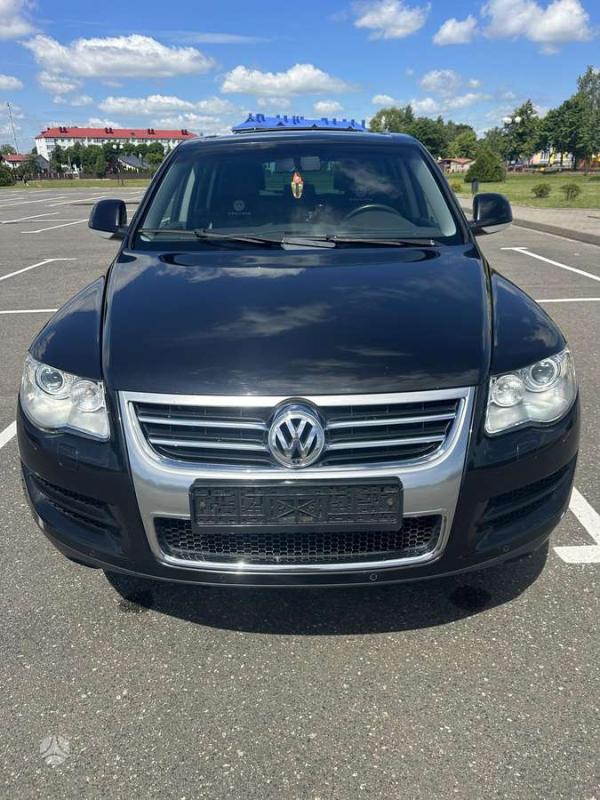 Black Volkswagen Touareg 2008 in Utena, with an engine capacity of 2.97 L and mileage of 305 thousand km for 4500 €, photo 9 on AUTOMOTO.COM.LV