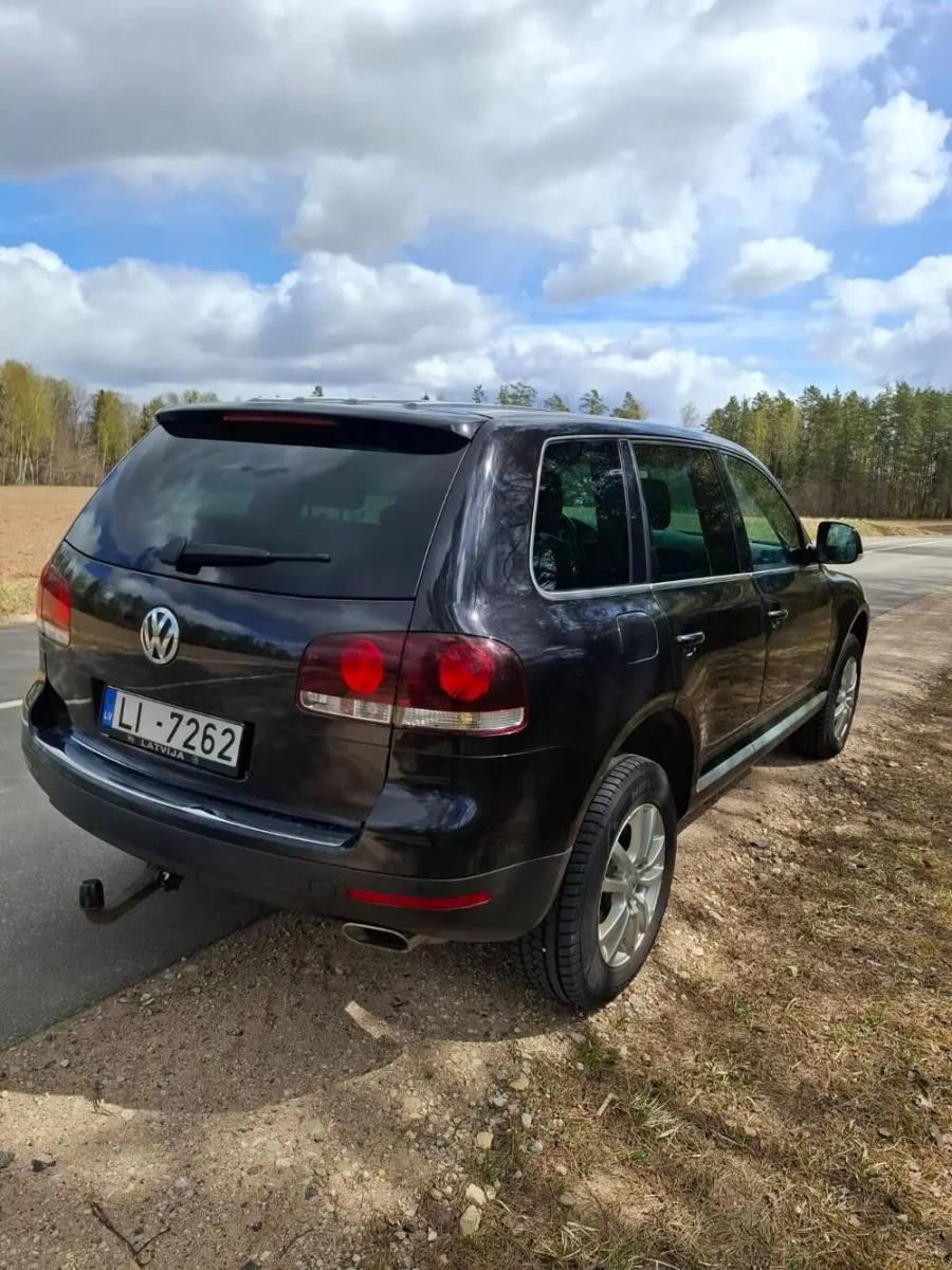 Melns Volkswagen Touareg 2008 Rīga, ar dzinēja tilpumu 3.00 L un nobraukumu 260 tūkst. km par 4700 €, foto 9 vietnē AUTOMOTO.COM.LV
