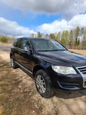 Melns Volkswagen Touareg 2008 Rīga, ar dzinēja tilpumu 3.00 L un nobraukumu 260 tūkst. km par 4700 €, foto 10 vietnē AUTOMOTO.COM.LV
