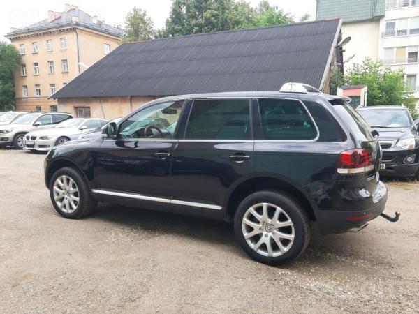 Black Volkswagen Touareg 2008 in Daugavpils, with an engine capacity of 3.00 L and mileage of 0 thousand km for 8950 €, photo 9 on AUTOMOTO.COM.LV