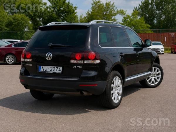 Melns Volkswagen Touareg 2008 Rīga, ar dzinēja tilpumu 3.00 L un nobraukumu 303 tūkst. km par 5390 €, foto 4 vietnē AUTOMOTO.COM.LV