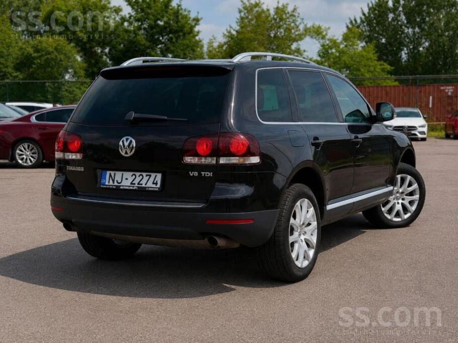 Melns Volkswagen Touareg 2008 Rīga, ar dzinēja tilpumu 3.00 L un nobraukumu 303 tūkst. km par 5390 €, foto 5 vietnē AUTOMOTO.COM.LV
