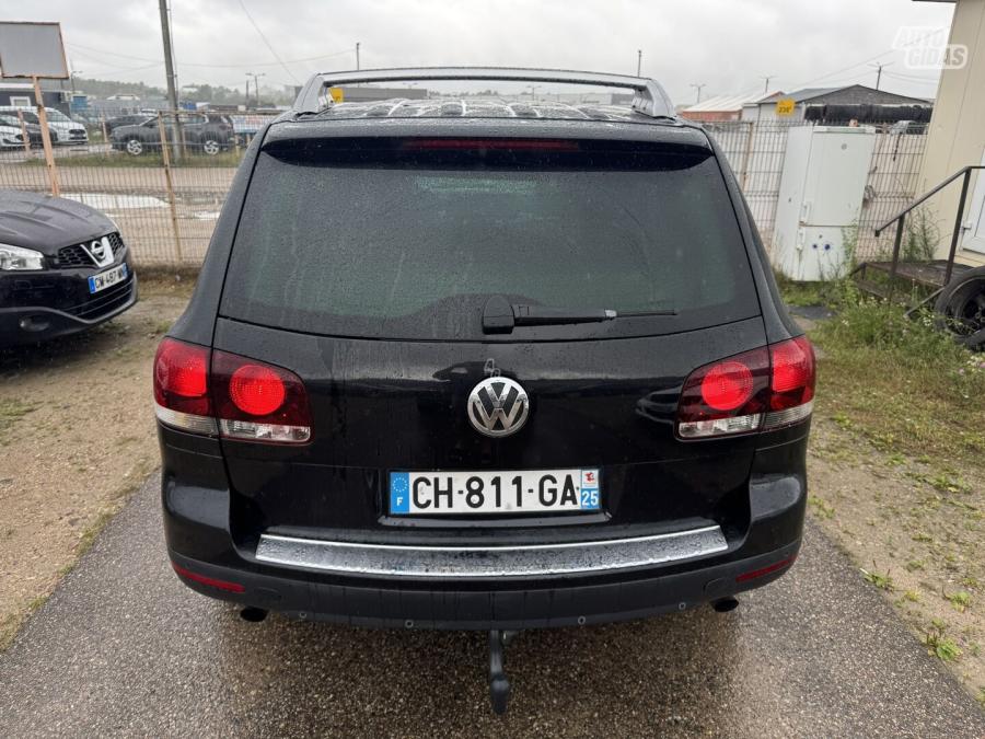 Black Volkswagen Touareg 2008 in Vilnius, with an engine capacity of 3.00 L and mileage of 249 thousand km for 4250 €, photo 7 on AUTOMOTO.COM.LV