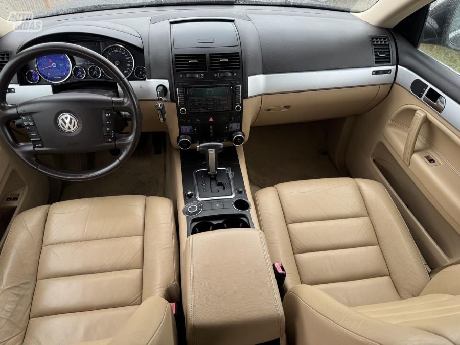 Black Volkswagen Touareg 2008 in Vilnius, with an engine capacity of 3.00 L and mileage of 249 thousand km for 4250 €, photo 8 on AUTOMOTO.COM.LV