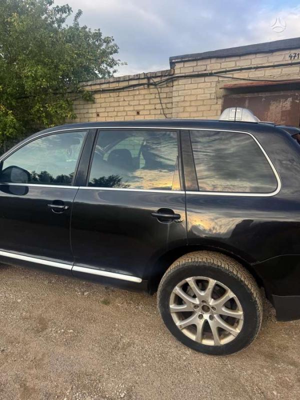 Melns Volkswagen Touareg 2008 Jonava, ar dzinēja tilpumu 3.00 L un nobraukumu 360 tūkst. km par 4500 €, foto 10 vietnē AUTOMOTO.COM.LV