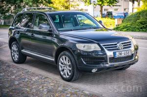 Black Volkswagen Touareg 2008 in Riga, with an engine capacity of 3.00 L and mileage of 346 thousand km for 1990 €, photo 4 on AUTOMOTO.COM.LV