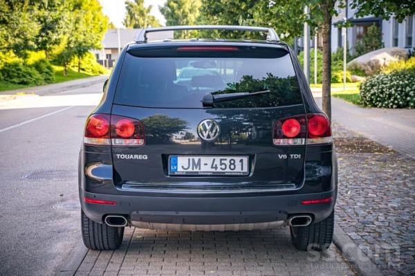 Black Volkswagen Touareg 2008 in Riga, with an engine capacity of 3.00 L and mileage of 346 thousand km for 1990 €, photo 5 on AUTOMOTO.COM.LV