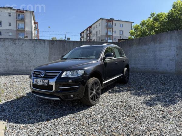 Black Volkswagen Touareg 2008 in Riga, with an engine capacity of 3.00 L and mileage of 310 thousand km for 6990 €, photo 2 on AUTOMOTO.COM.LV