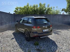 Melns Volkswagen Touareg 2008 Rīga, ar dzinēja tilpumu 3.00 L un nobraukumu 310 tūkst. km par 6990 €, foto 4 vietnē AUTOMOTO.COM.LV