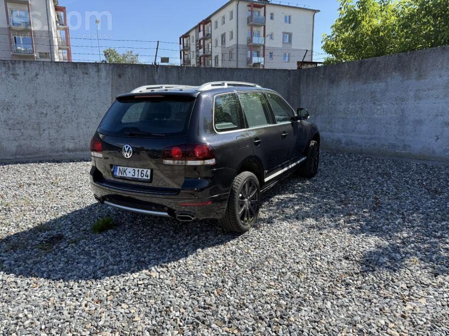 Melns Volkswagen Touareg 2008 Rīga, ar dzinēja tilpumu 3.00 L un nobraukumu 310 tūkst. km par 6990 €, foto 5 vietnē AUTOMOTO.COM.LV