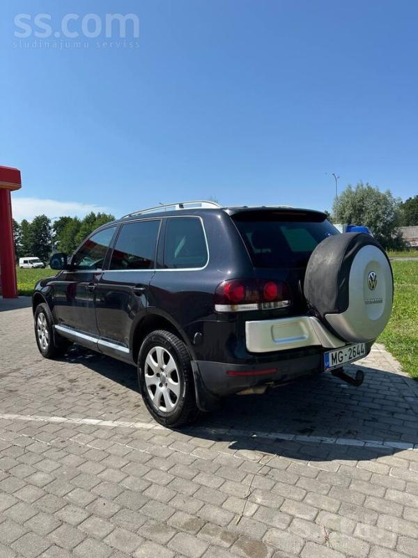 Black Volkswagen Touareg 2008 in Riga, with an engine capacity of 3.00 L and mileage of 322 thousand km for 5000 €, photo 3 on AUTOMOTO.COM.LV
