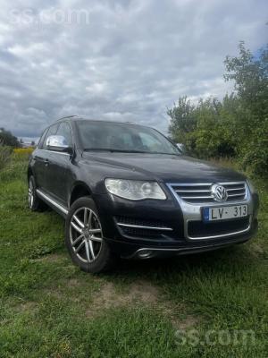 Black Volkswagen Touareg 2008 in Riga, with an engine capacity of 3.00 L and mileage of 319 thousand km for 2100 €, photo  on AUTOMOTO.COM.LV