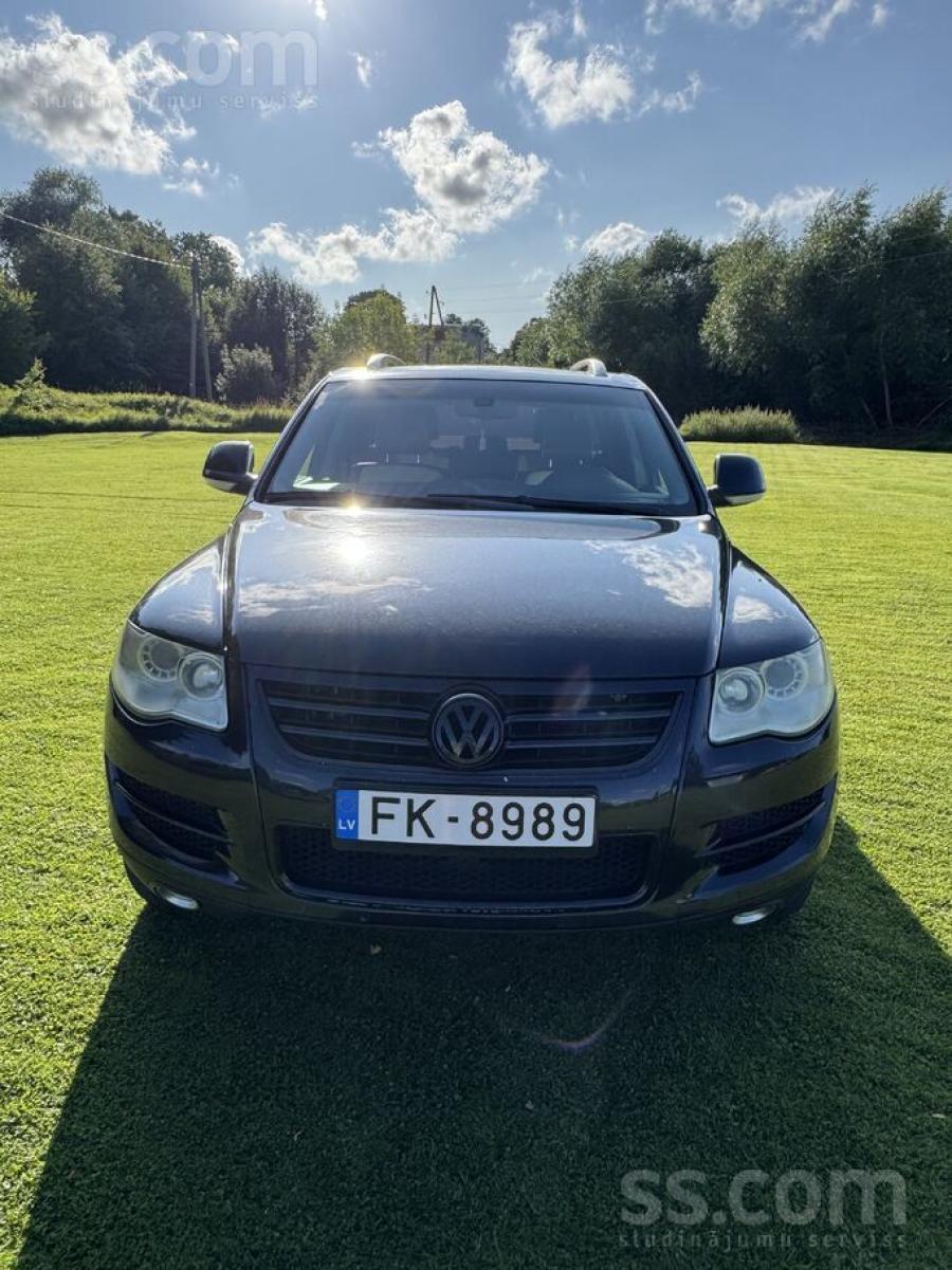 Black Volkswagen Touareg 2008 in Ventspils, with an engine capacity of 3.00 L and mileage of 345 thousand km for 5400 €, photo 6 on AUTOMOTO.COM.LV