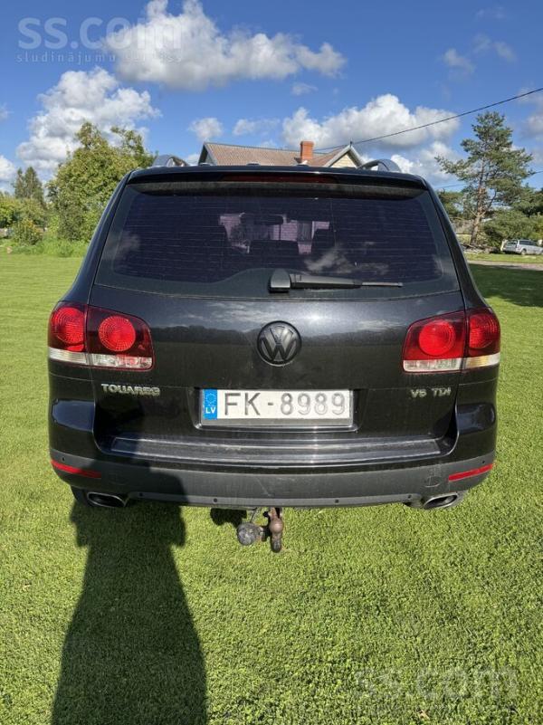 Black Volkswagen Touareg 2008 in Ventspils, with an engine capacity of 3.00 L and mileage of 345 thousand km for 5400 €, photo 6 on AUTOMOTO.COM.LV