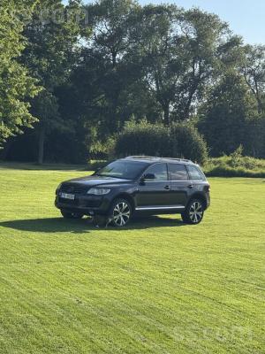 Black Volkswagen Touareg 2008 in Ventspils, with an engine capacity of 3.00 L and mileage of 345 thousand km for 5400 €, photo 29 on AUTOMOTO.COM.LV