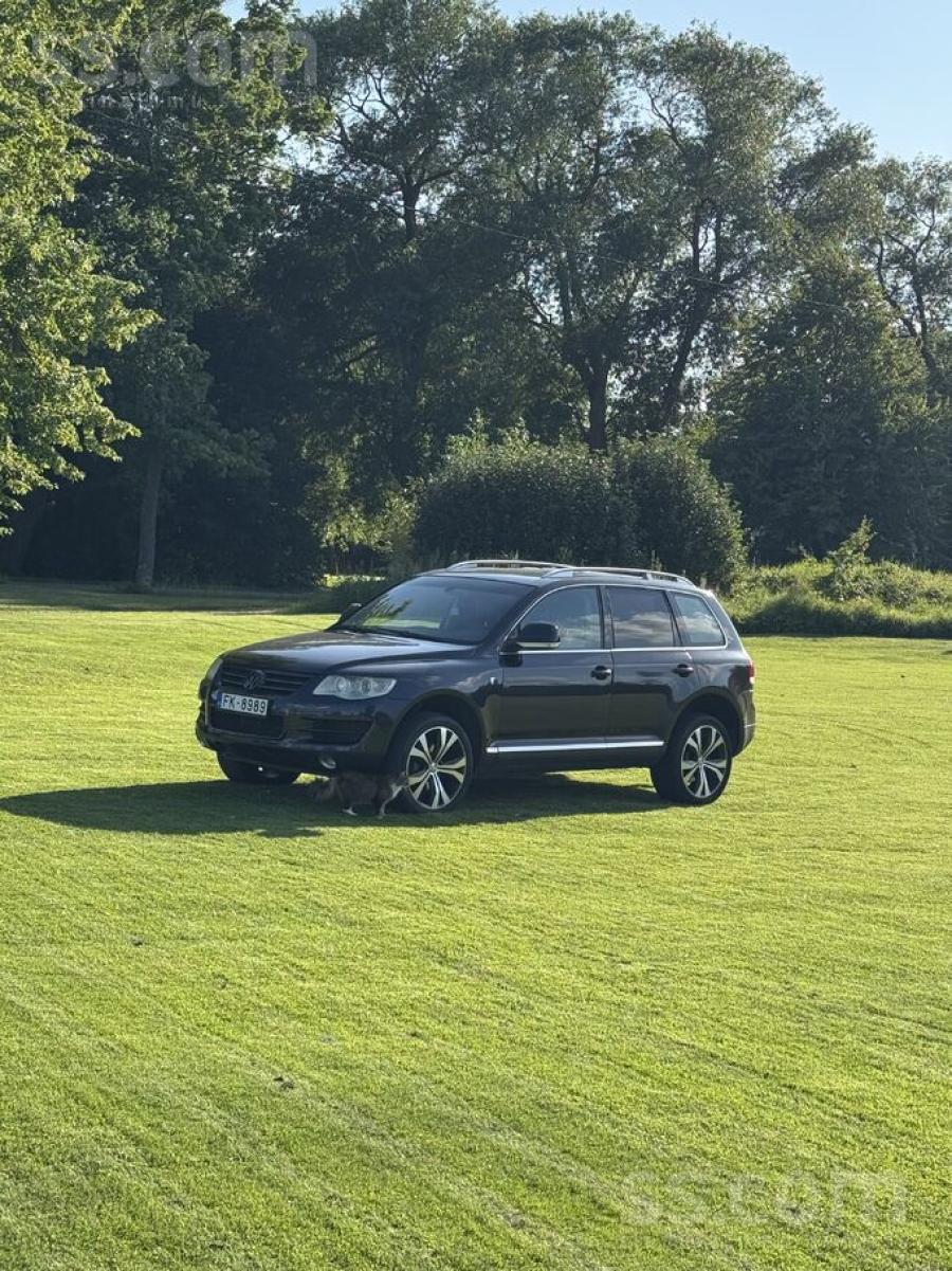 Black Volkswagen Touareg 2008 in Ventspils, with an engine capacity of 3.00 L and mileage of 345 thousand km for 5400 €, photo 29 on AUTOMOTO.COM.LV