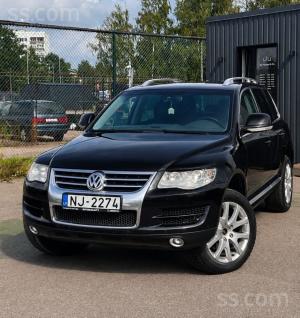 Black Volkswagen Touareg 2008 in Riga, with an engine capacity of 3.00 L and mileage of 304 thousand km for 5990 €, photo  on AUTOMOTO.COM.LV