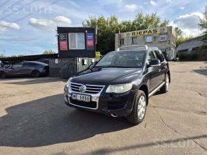 Black Volkswagen Touareg 2008 in Riga, with an engine capacity of 3.00 L and mileage of 295 thousand km for 3790 €, photo  on AUTOMOTO.COM.LV