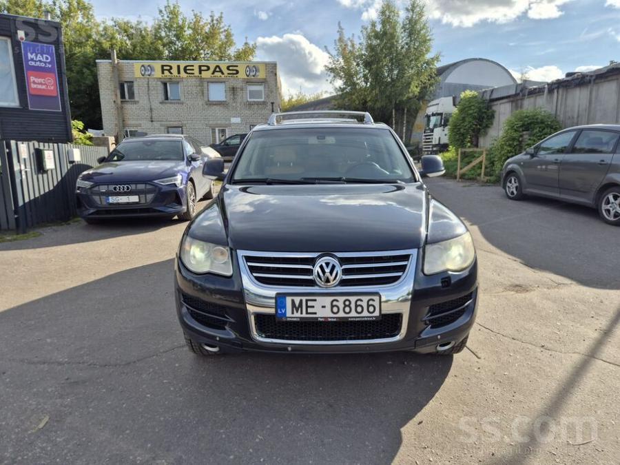 Melns Volkswagen Touareg 2008 Rīga, ar dzinēja tilpumu 3.00 L un nobraukumu 295 tūkst. km par 3790 €, foto 4 vietnē AUTOMOTO.COM.LV