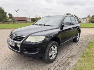 Black Volkswagen Touareg 2008 in Riga, with an engine capacity of 3.00 L and mileage of 280 thousand km for 4350 €, photo  on AUTOMOTO.COM.LV