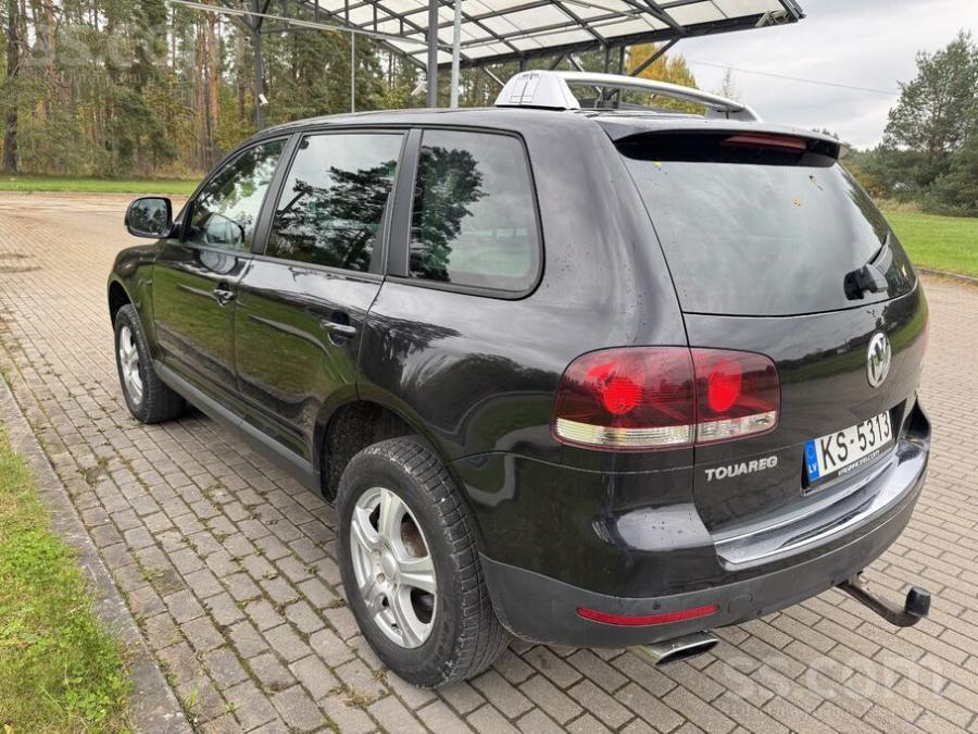 Black Volkswagen Touareg 2008 in Riga, with an engine capacity of 3.00 L and mileage of 280 thousand km for 4350 €, photo 6 on AUTOMOTO.COM.LV