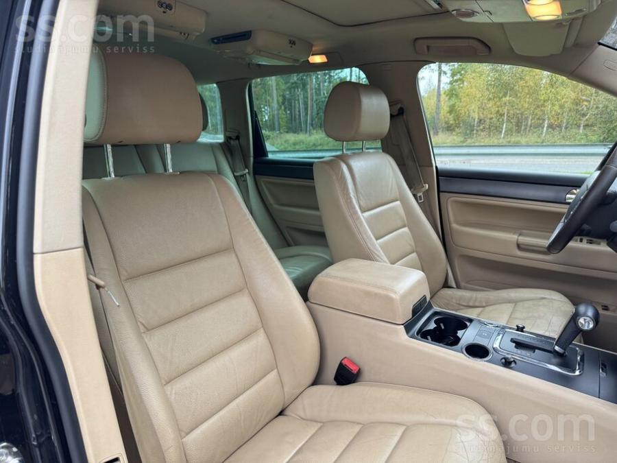 Black Volkswagen Touareg 2008 in Riga, with an engine capacity of 3.00 L and mileage of 280 thousand km for 4350 €, photo 8 on AUTOMOTO.COM.LV